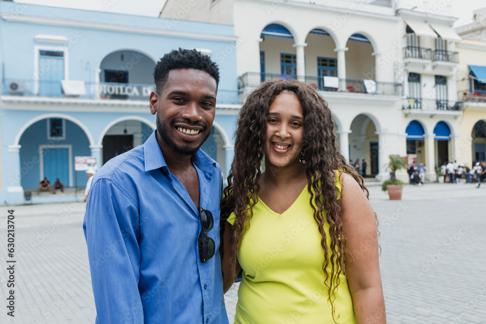portrait of african american couple man and woman in colonial city in ...