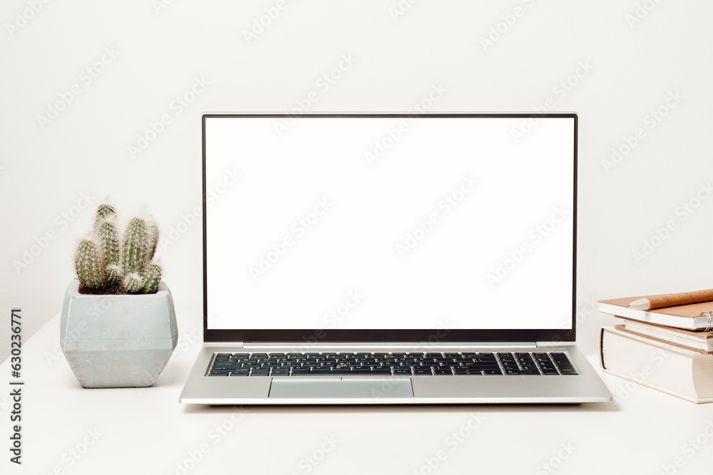 Laptop mockup with white screen and cactus with books and notepads ... Laptop mockup with white screen and cactus with books and notepads ...