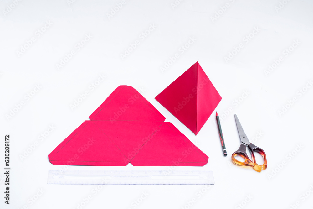 Build a triangular prism out of paper Stock Photo | Adobe Stock