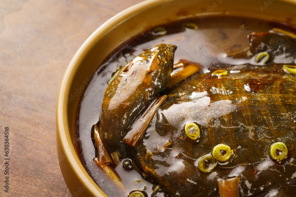 Special Chinese food Braised soft-shelled turtle with scallions on a ...