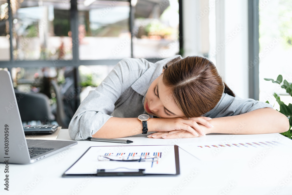 Sleep at work. Tired, overworking young business woman dreaming in ...