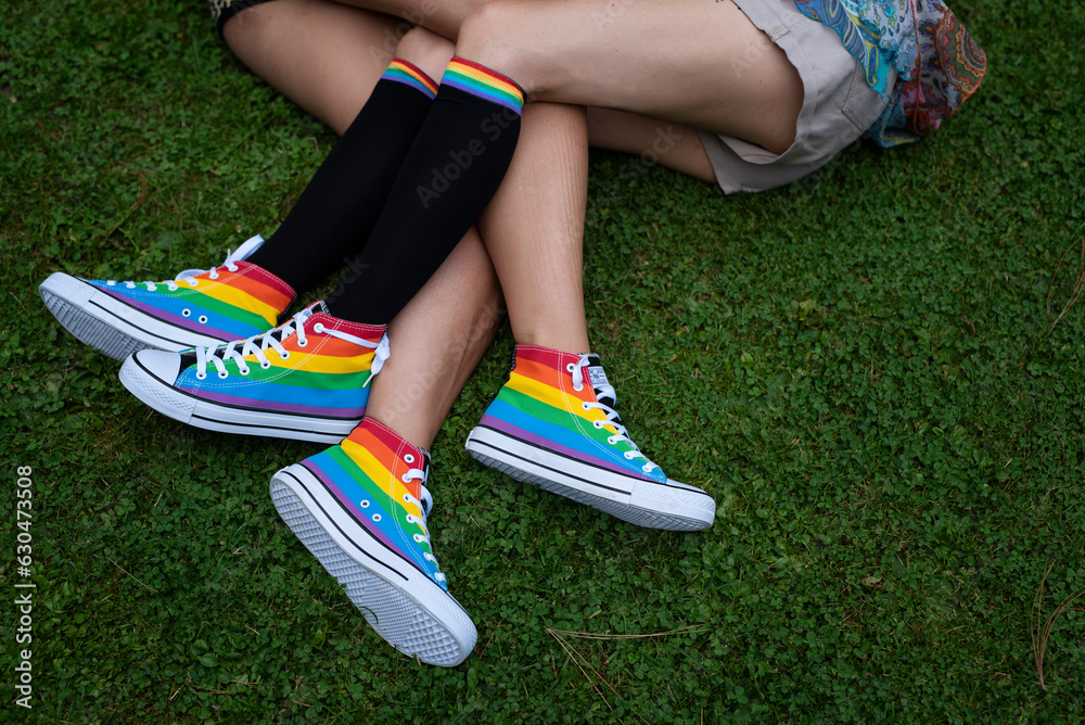 Sexy legs of lesbian in rainbow shoes as a symbol of lgbt. Colors of ...