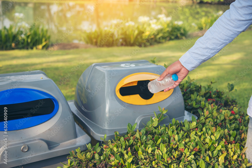 Men hands trow Trash cans for sorting garbage recycle bin waste plastic ...
