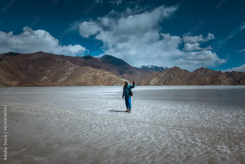 Amidst the breathtaking winter wonderland of Pangong Lake, an exuberant ...