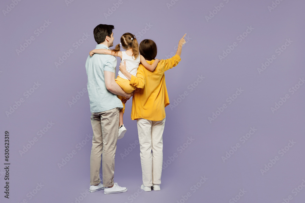 Full body back rear view young parents mom dad child kid girl 6 years ...