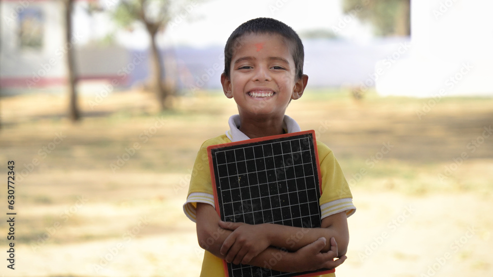 Cute indian little child studying at home. Indian kid studying Stock ...