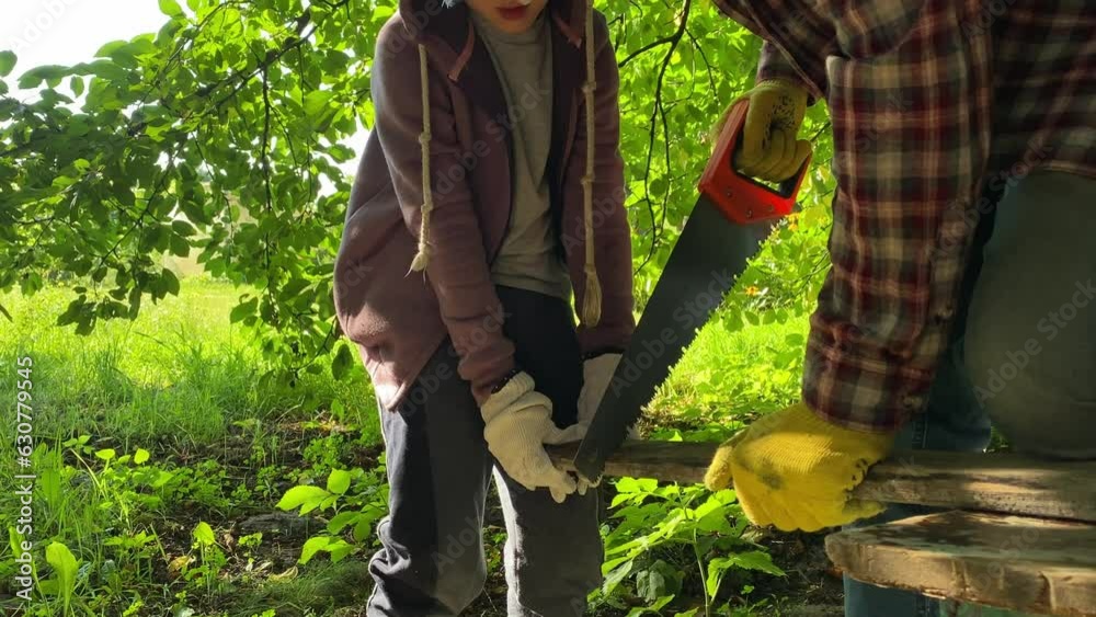 Father children team up to build treehouse. Little boy and lovely girl ...