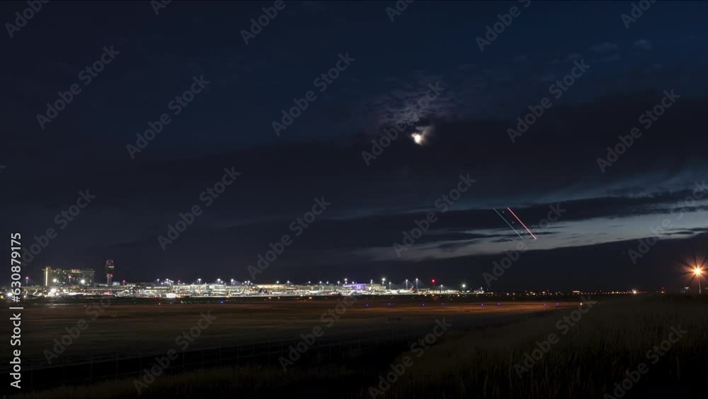 Time lapse YVR airport at dusk with main airport terminal, departure ...