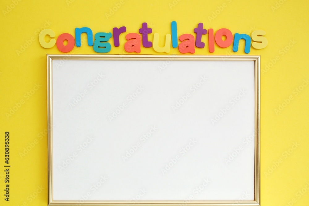 Colorful alphabet word Congratulations and frame on yellow background ...