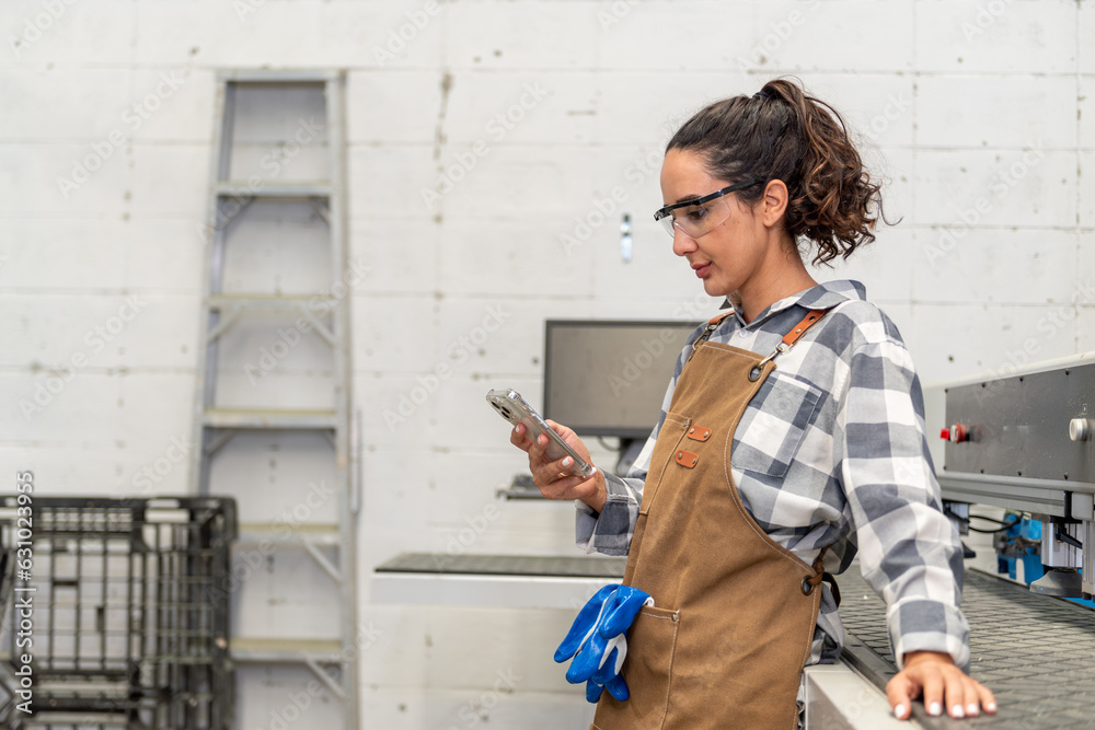 One Strong confident young aged women carpenter standing aim at wood ...