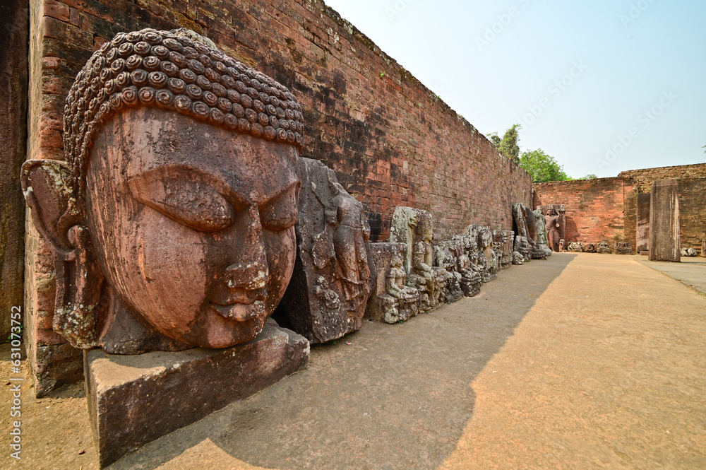 Gaint stone head of Meditating Buddha hand carved in stone along with ...