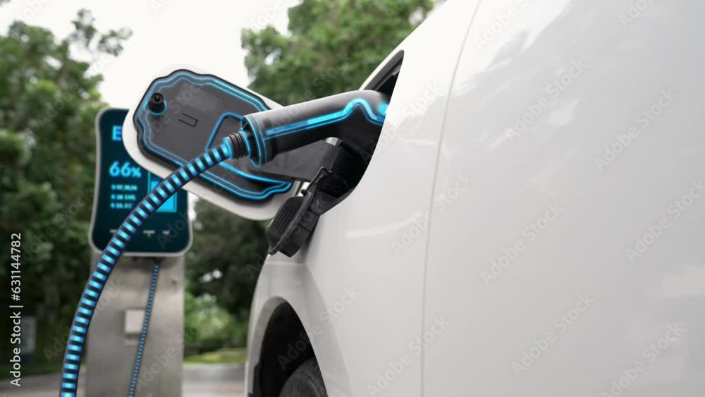 Electric car recharging battery by futuristic smart EV charger from eco ...