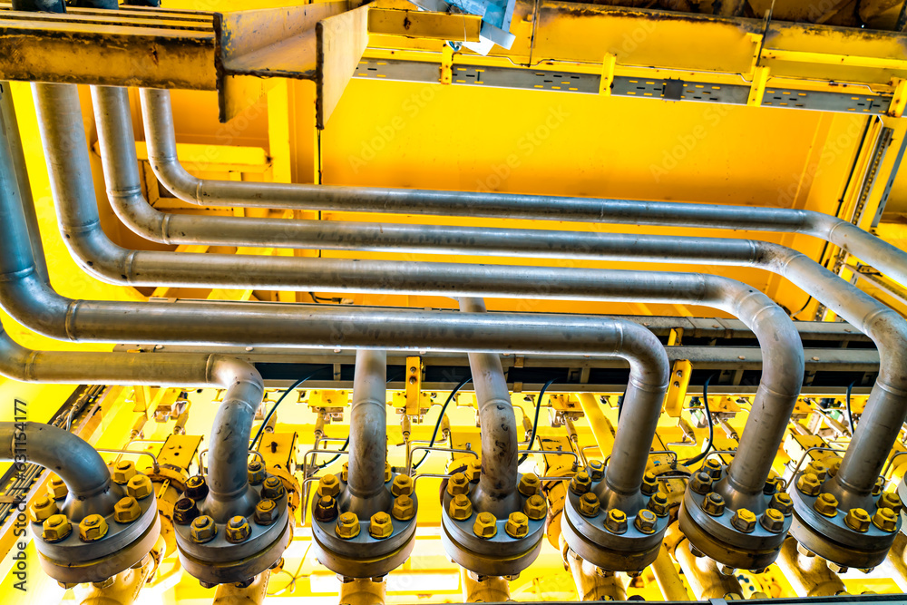 A steel pipe with another pipe connected by several large welded pipes ...