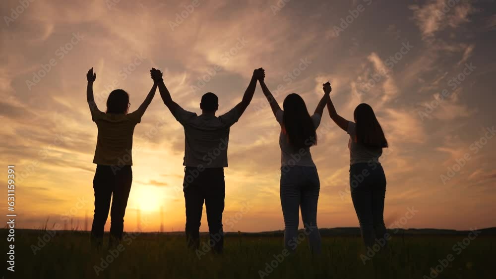 friendly team of people silhouette a raise their hands up. business ...