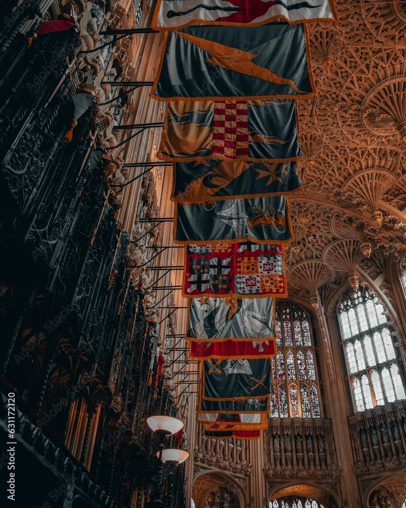 Series of flags waving atop the grand columns of Westminster Castle in ...