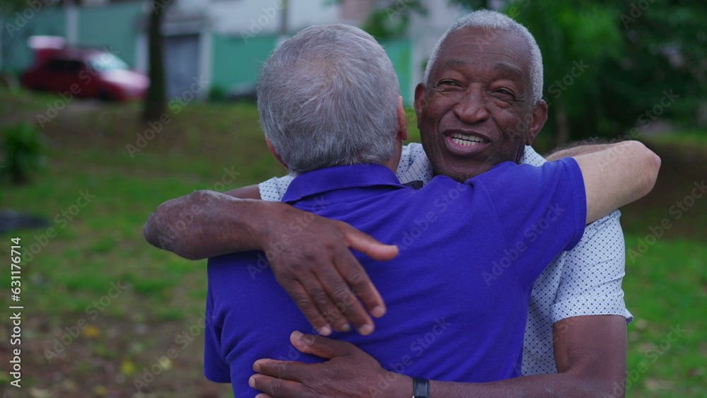 Two diverse Brazilian senior Friends Share Warm Embrace in Park. Old ...