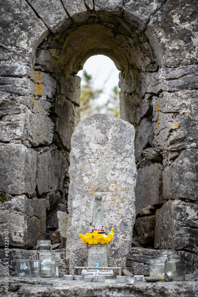 Worship statue at old Church ruins at Inisheer Aran Island Ireland ...