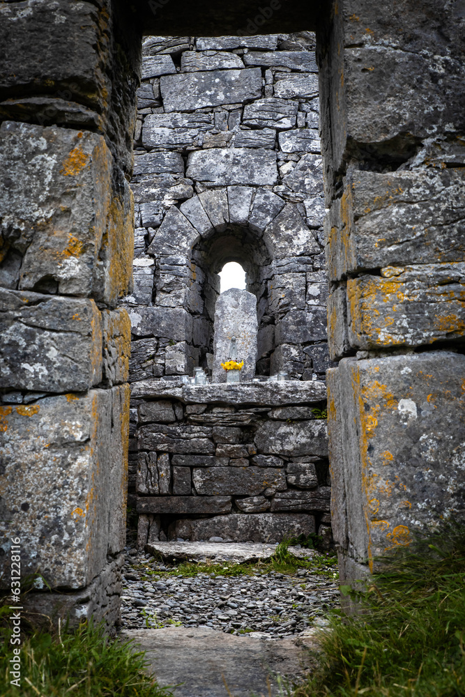 Worship statue at old Church ruins at Inisheer Aran Island Ireland ...