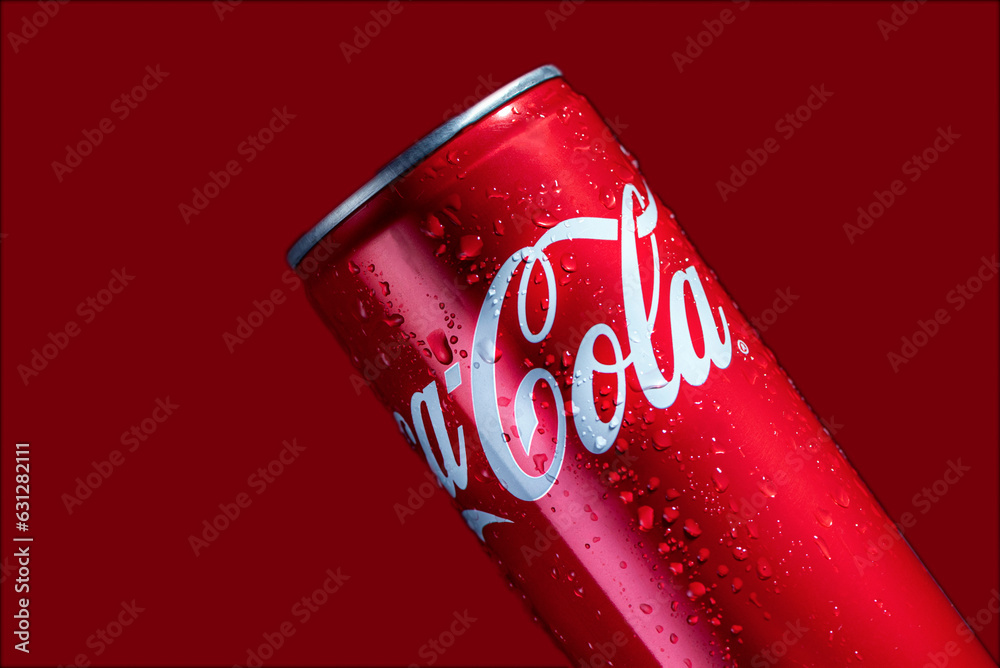 The Coca Cola drink on a red background, details, close up 07.28.2023 ...