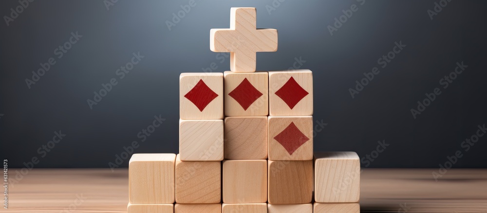 Wooden cube blocks stacked in a plus sign shape represents added value ...