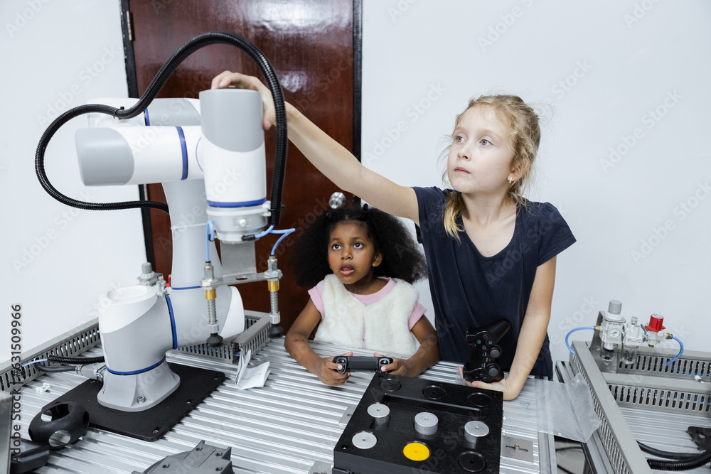 Children girl caucasian using joystick and girl African American ...