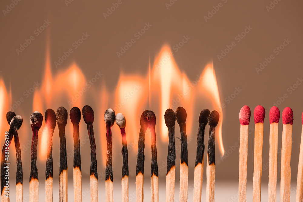 Concept of matches in a row indicating separation from others to ...