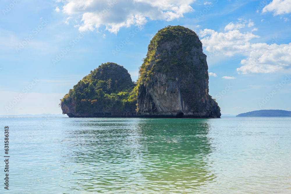 Ko Rang Nok limestone karst islet covered with rainforest seen from ...