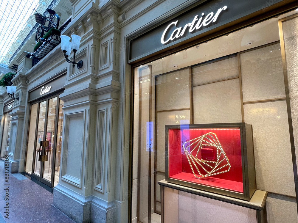Boutique of Cartier famous brand in stylish shopping mall. French ...