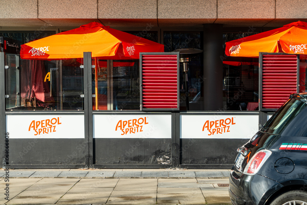 Aperol Spritz signs and parasols with large logo on a terrace at a ...