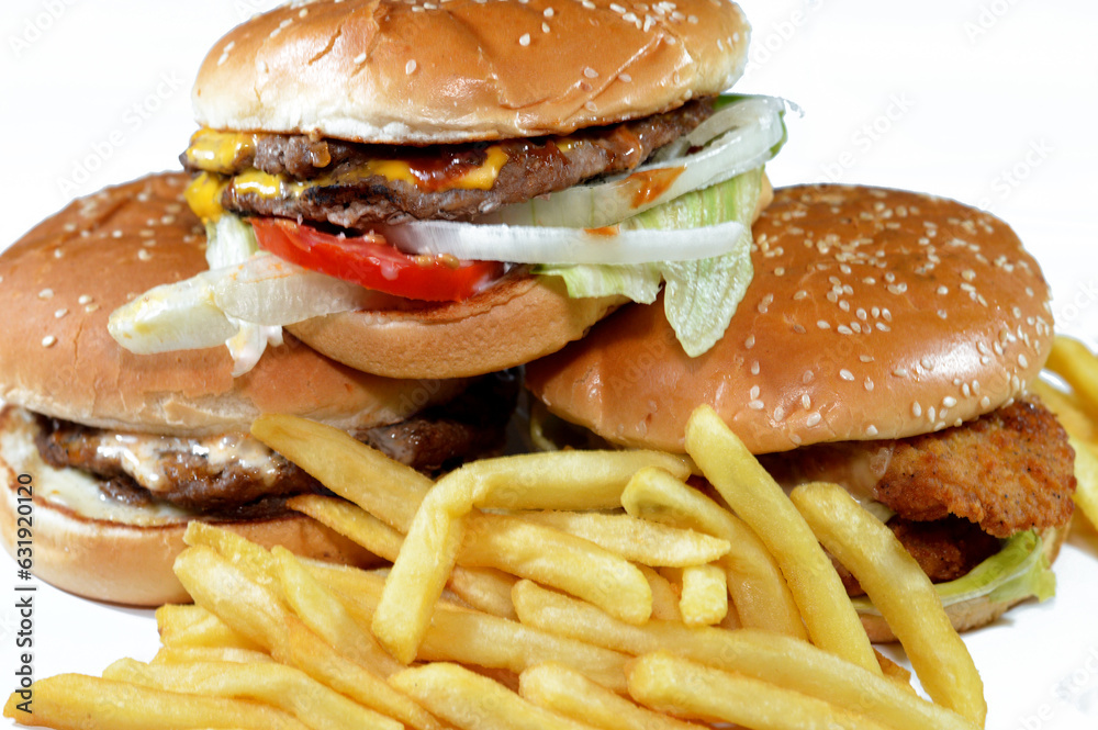 Sesame buns of fried breaded chicken fillet patties, crisp lettuce ...