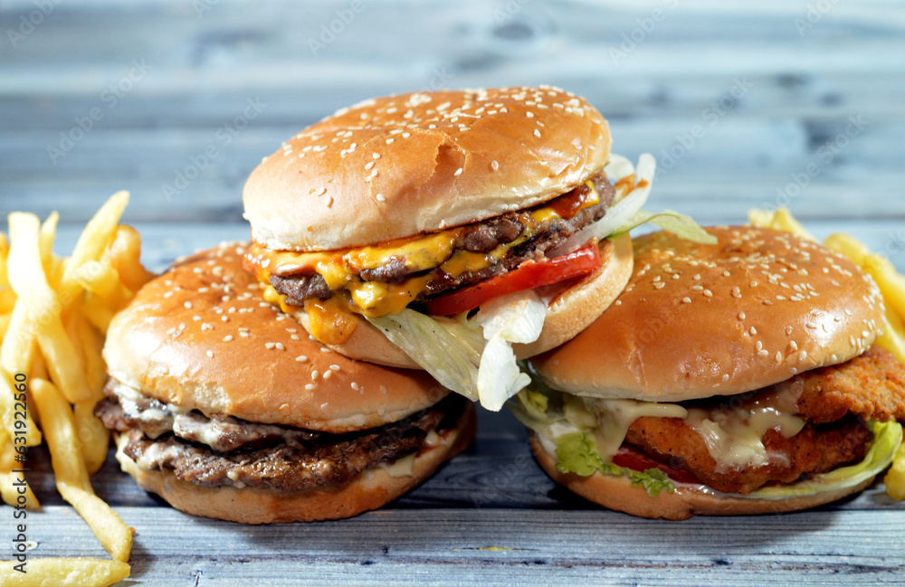 Sesame buns of fried breaded chicken fillet patties, crisp lettuce ...
