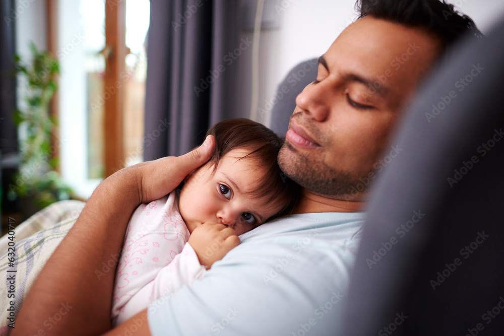 Affectionate father hugging his baby daughter at home Stock Photo ...
