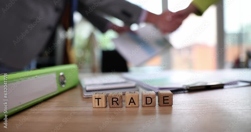 Male and female handshake in office text trade. Partners made a deal ...
