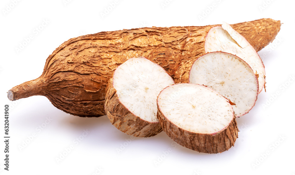 Cassava tubers with leaves and cassava slices isolated on white ...