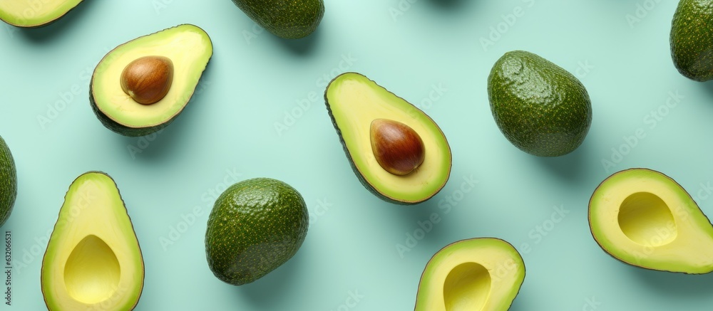 The design features a simple pattern of green avocados on a light blue ...