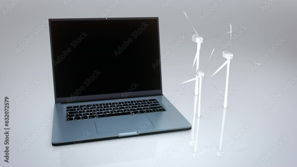 Modern laptop next to three wind turbines for green energy production ...
