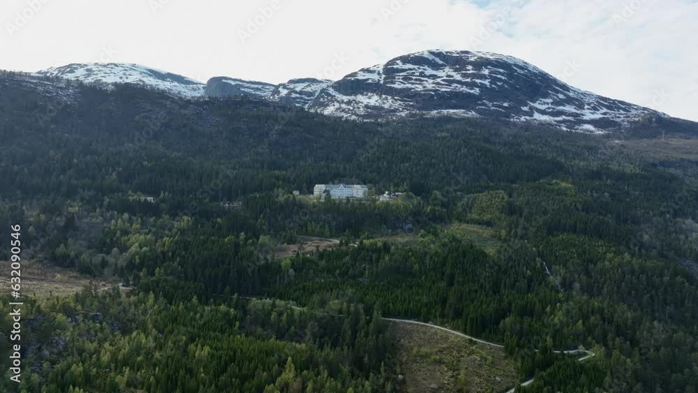 Harastolen Luster - Aerial approaching majestic mountain building with ...