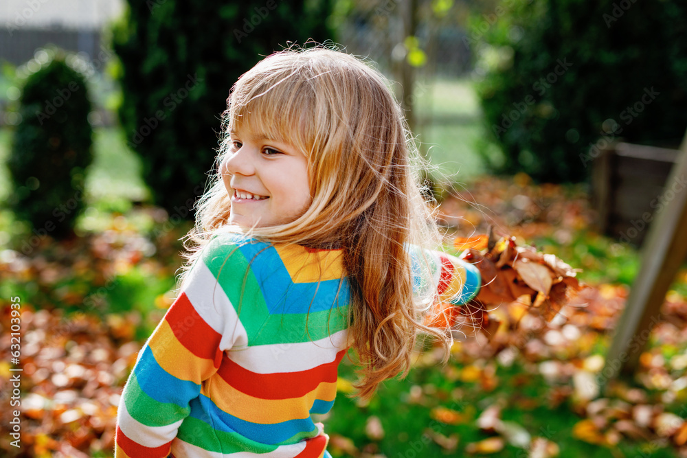 Fall portrait of little preschool girl in autumn park on warm october ...
