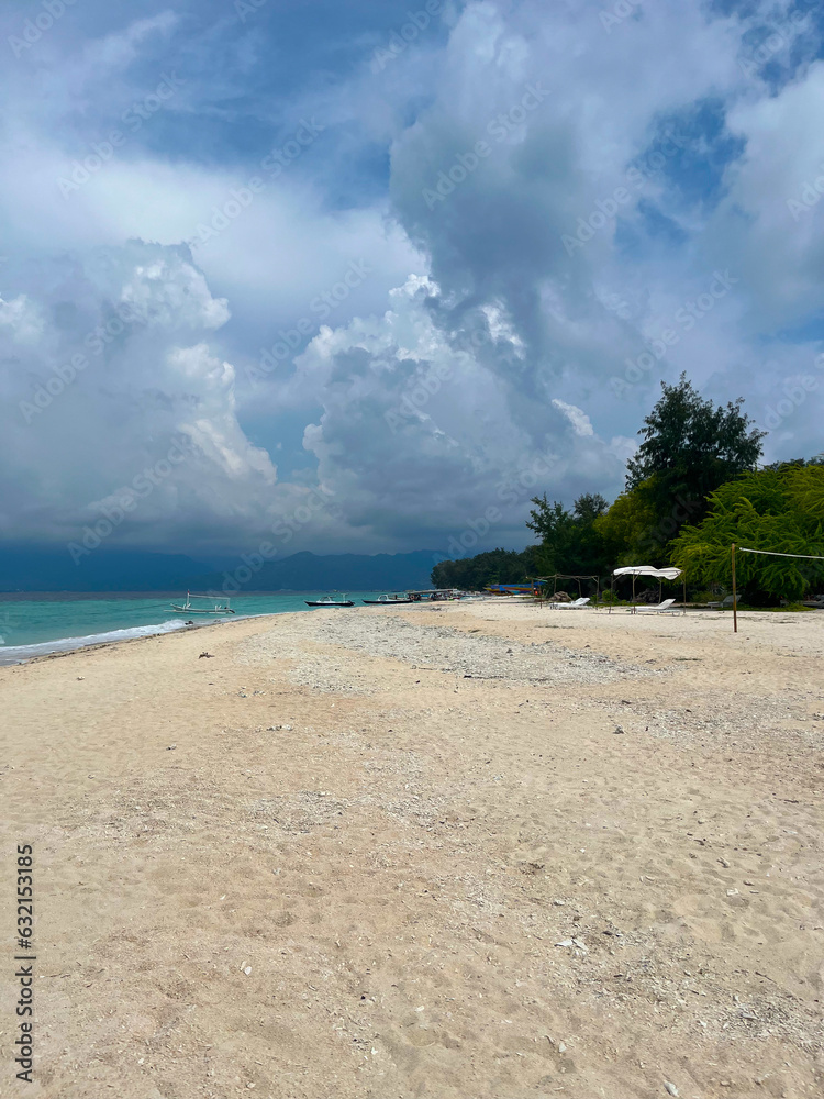 White beach with sky and trees. Beautiful turquoise ocean. Indonesia ...