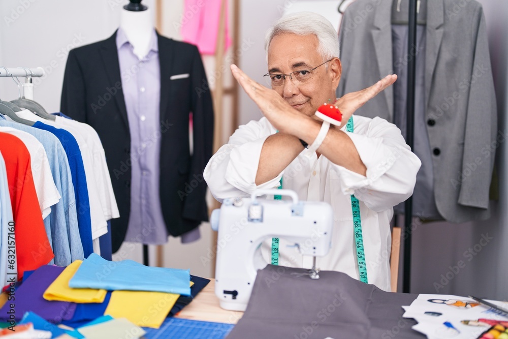 Middle age man with grey hair dressmaker using sewing machine rejection ...