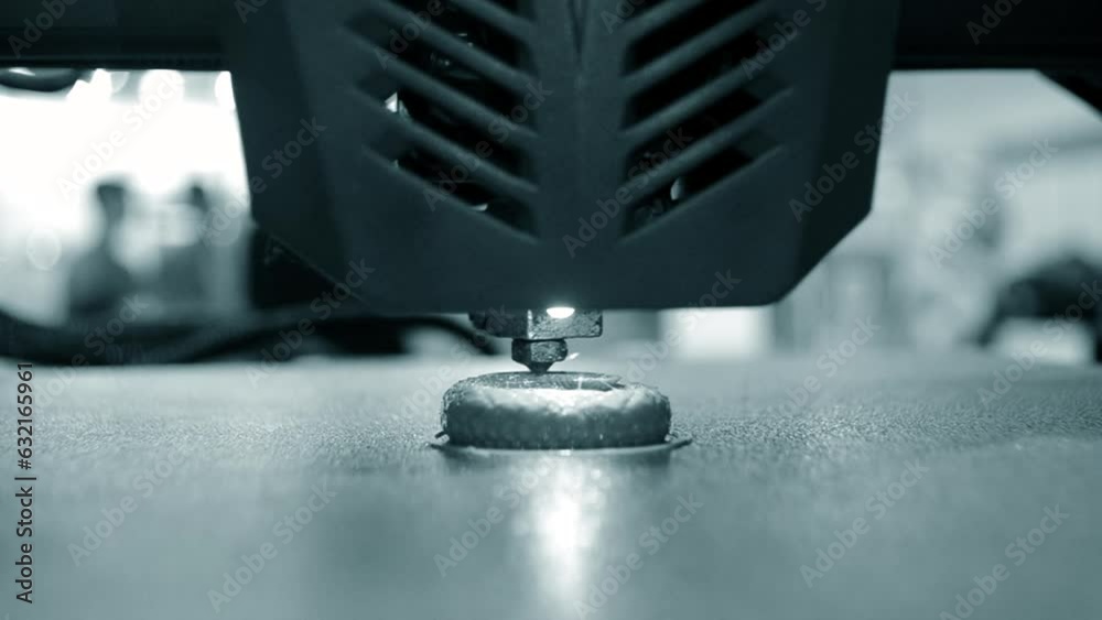 Working 3D printer printing an object from plastic. Printing a model ...