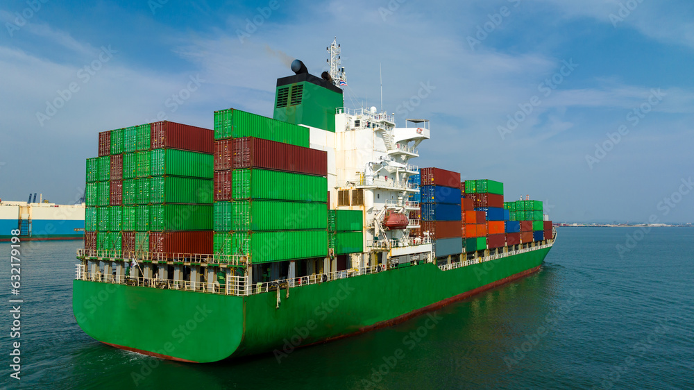 wide angle shot rear view of cargo container ship sailing in sea blue ...