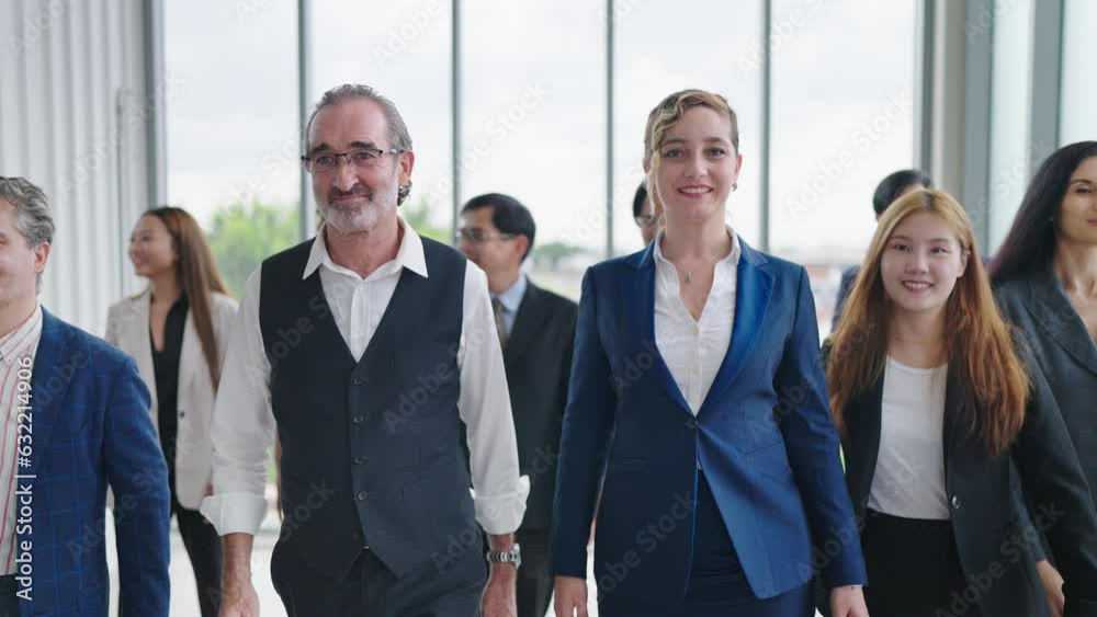 Businesspeople group walking at modern office. Group of diverse ...