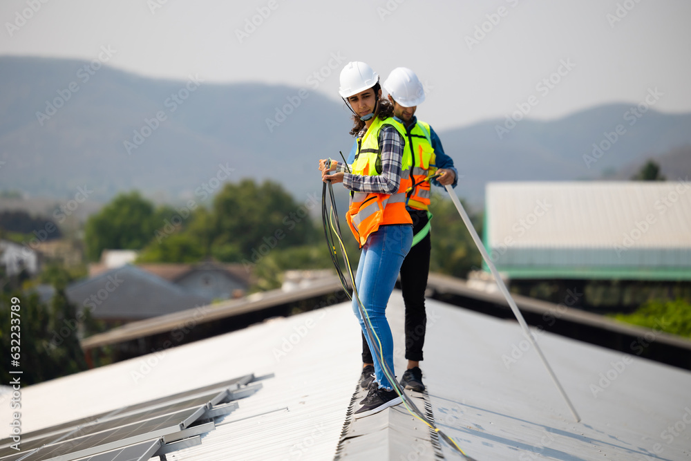 Electrician pulling wire into PVC pipe electrical engineering female ...