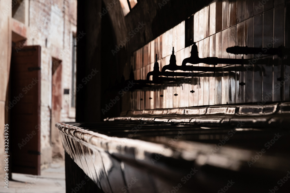 Water taps in washroom in the Small Fortress, which served as a Prague ...