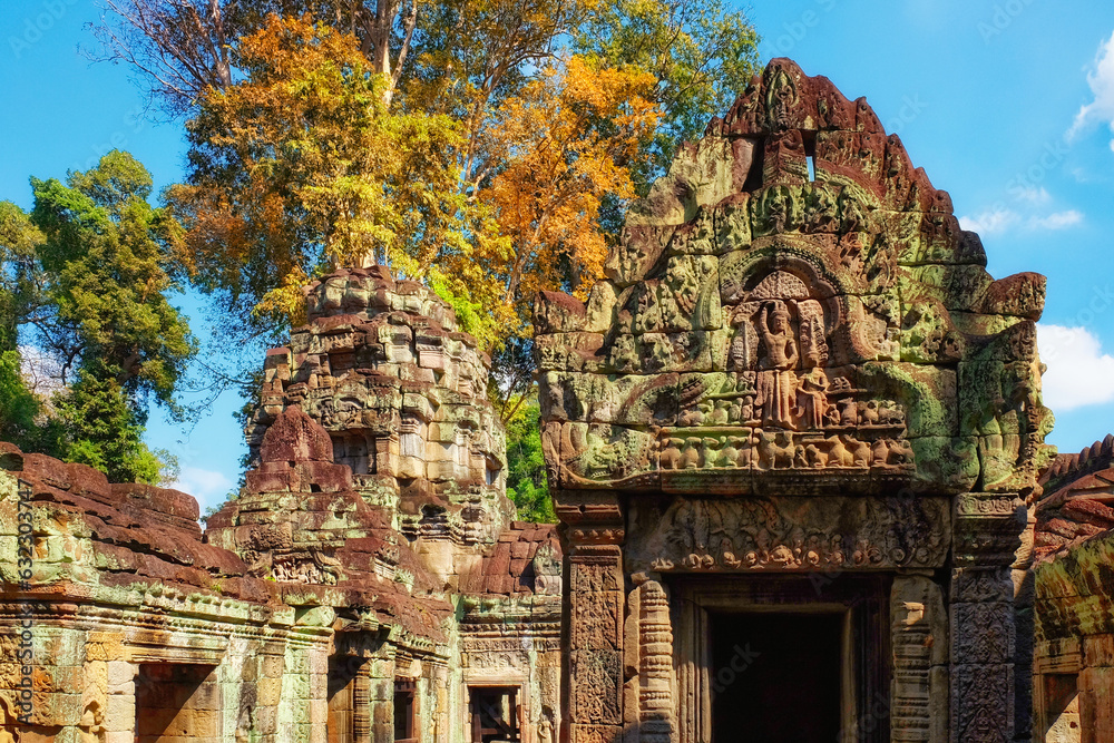 Decorative carvings on the walls of an ancient Khmer building, medieval ...