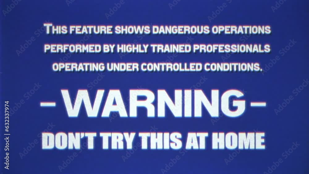 A VHS tape playing a simple warning text message, Do not try this at ...