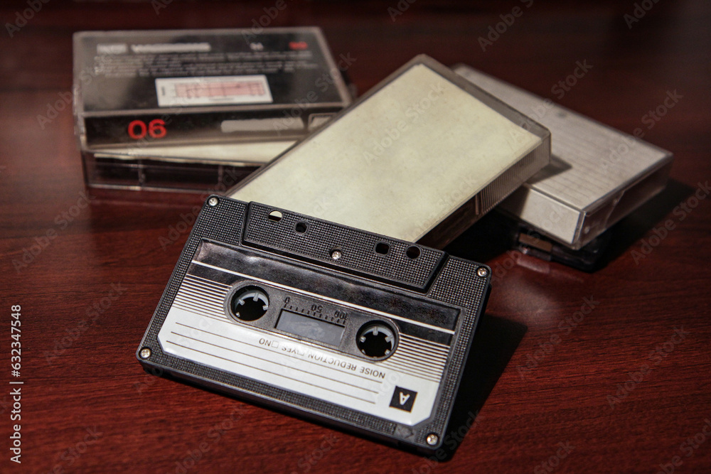 Blank cassette tape box on old wooden table background. Vintage ...