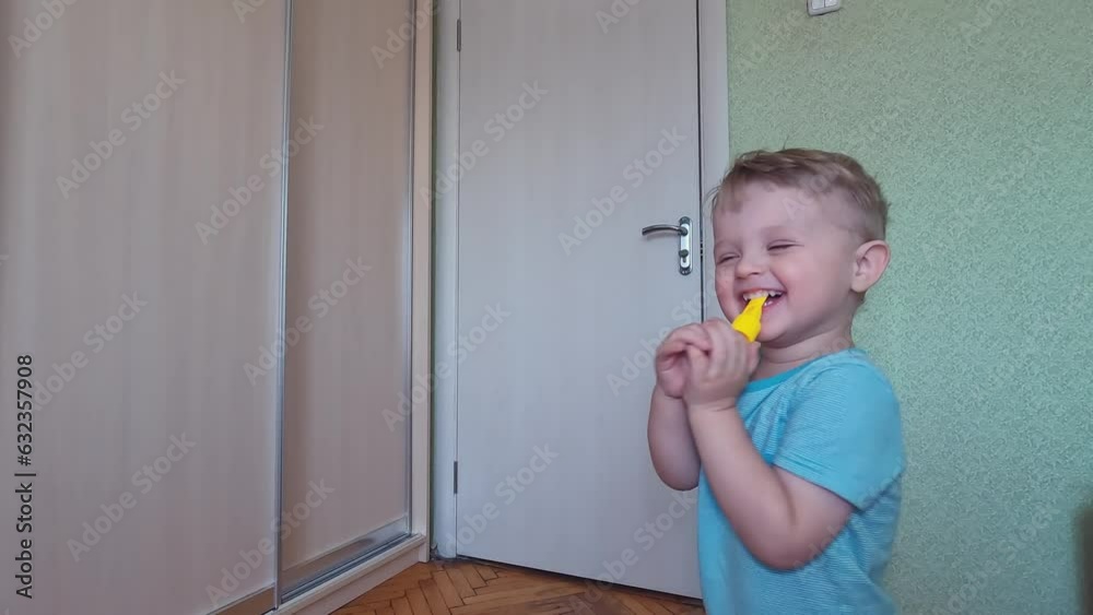Video „Little boy blowing a whistle at home. Concepts about breathing ...