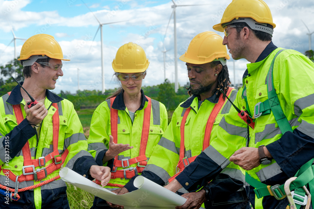 Smart professional engineers working in fieldwork outdoor. Workers ...